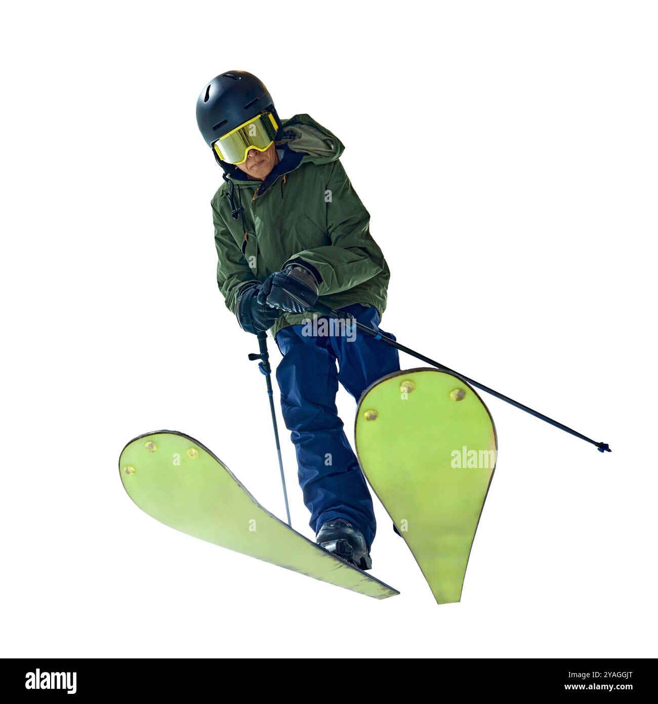 Wide-angle shot of skier leaning into the turn, maintaining control at high speed against white ...