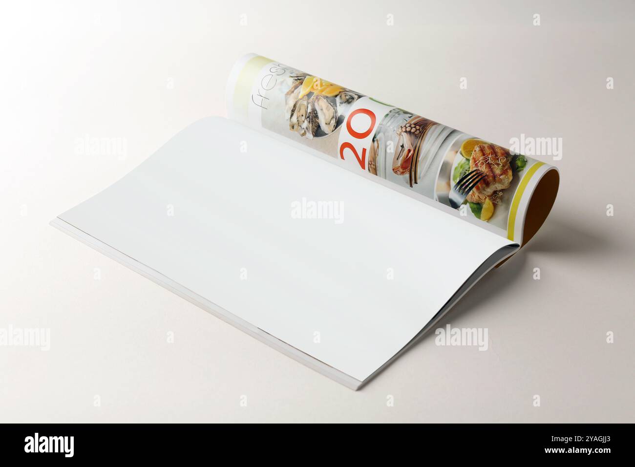Open magazine on white background. Mockup for design Stock Photo - Alamy