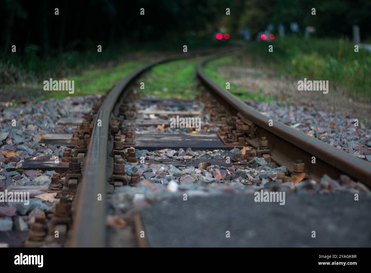 The train tracks are empty and the train is not visible. The tracks are ...