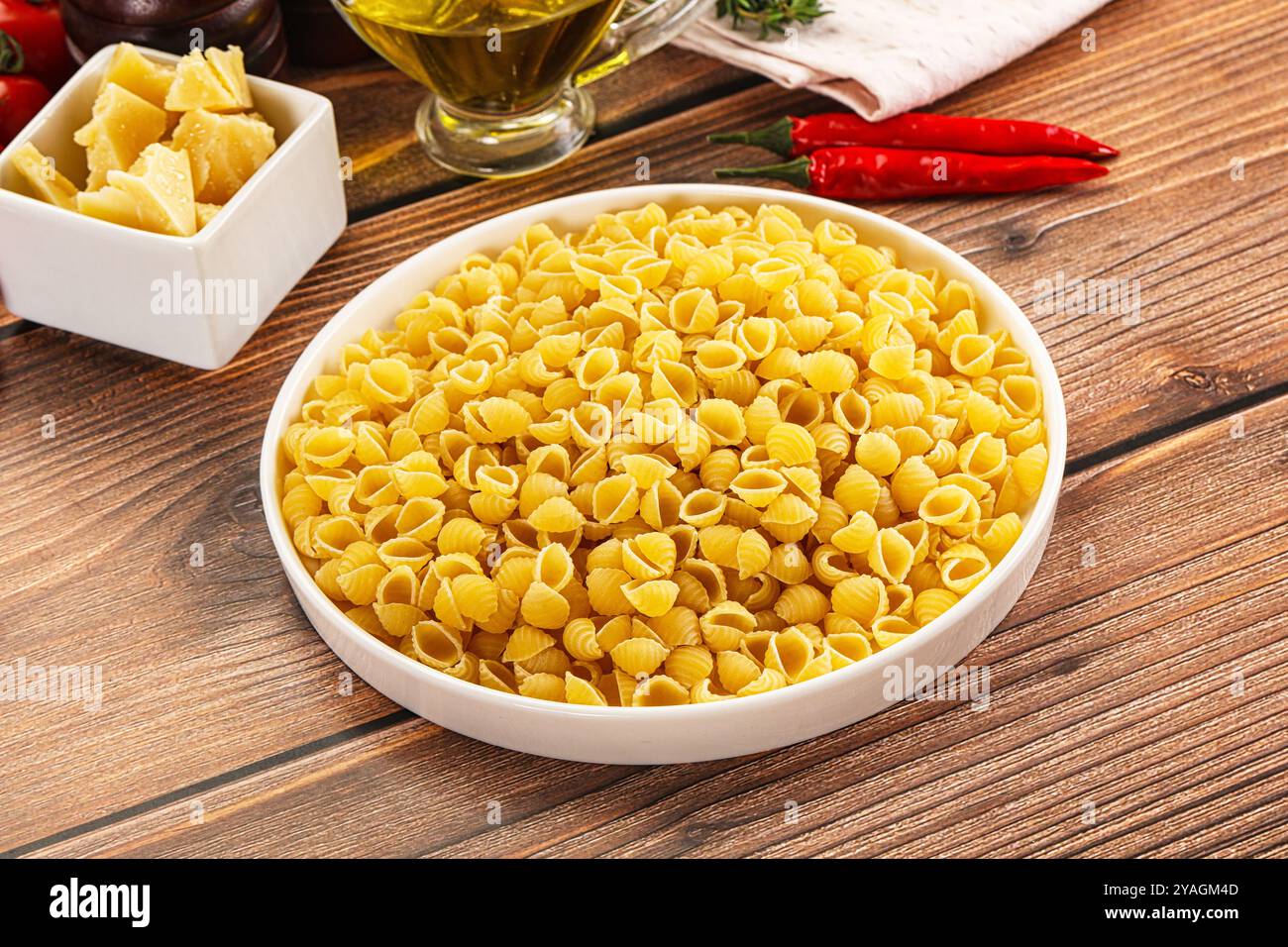 Italian cuisine - dry conchiglie shell pasta Stock Photo - Alamy