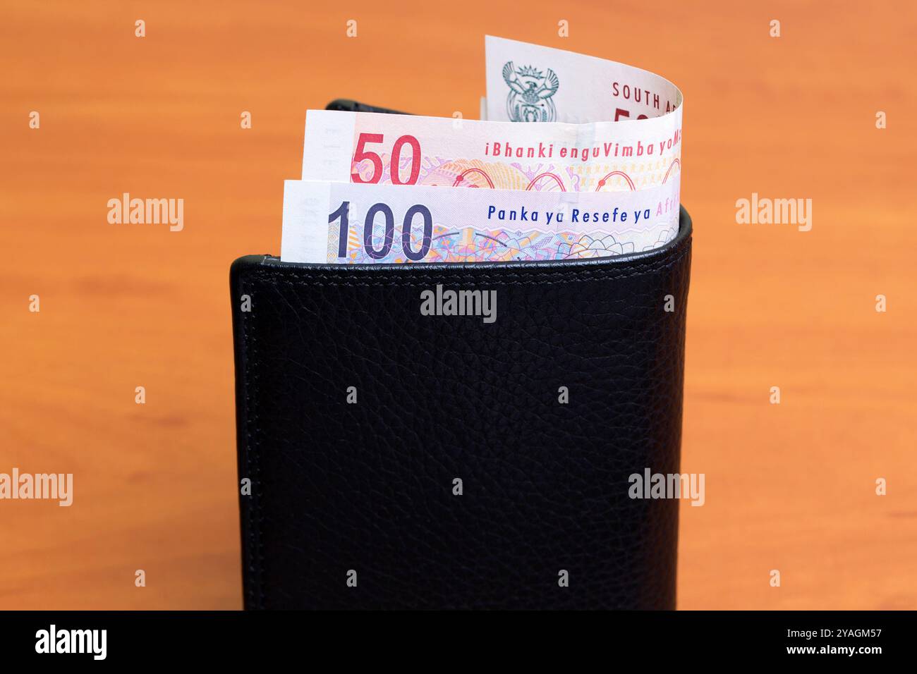 South African money - rand in the black wallet Stock Photo - Alamy