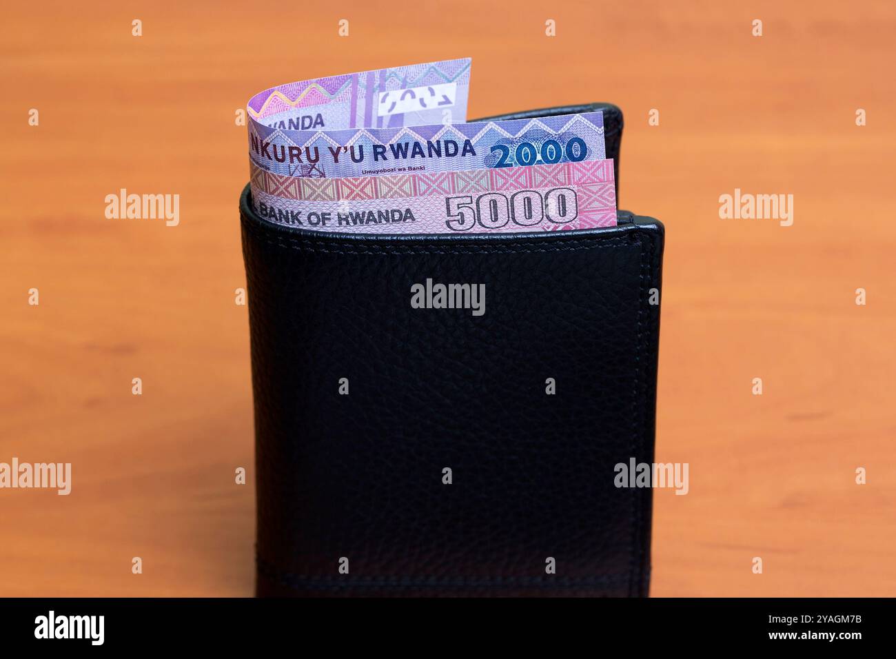 Rwandan money - franc in the black wallet Stock Photo - Alamy