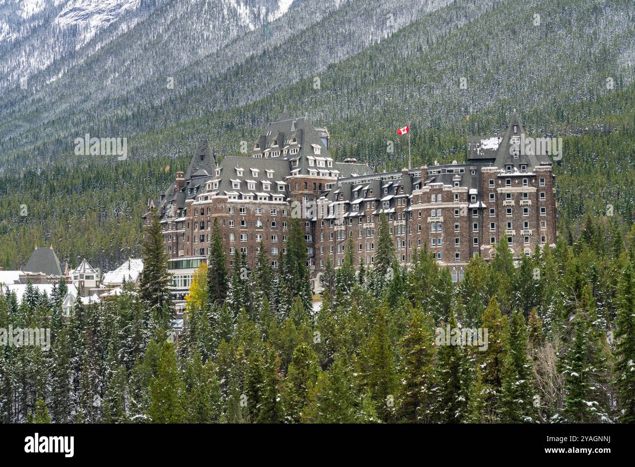 Fairmont Banff Springs in snowy autumn sunny day. View from Surprise ...