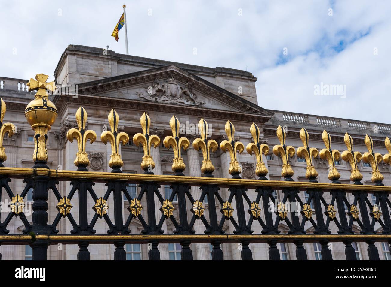 London, United Kingdom: Part of the black cast iron grid with gilded ...