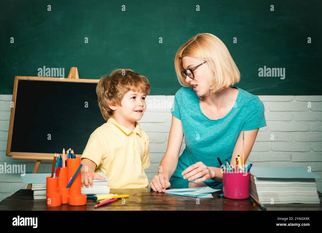 Elementary school - education and learning child concept. Teacher ...