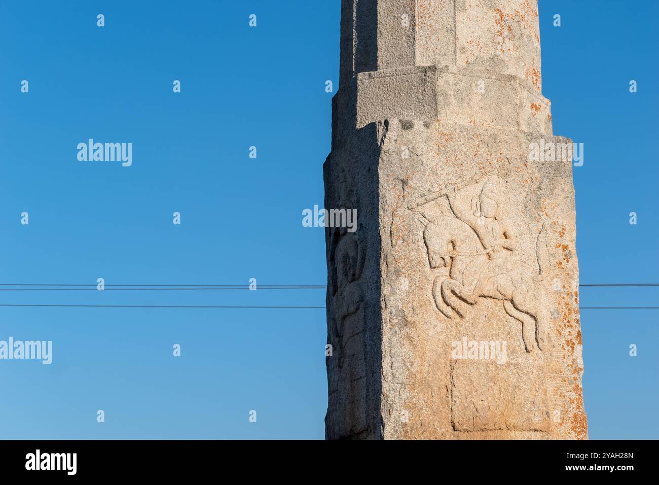 This image captures the intricately carved details of a historic stone ...