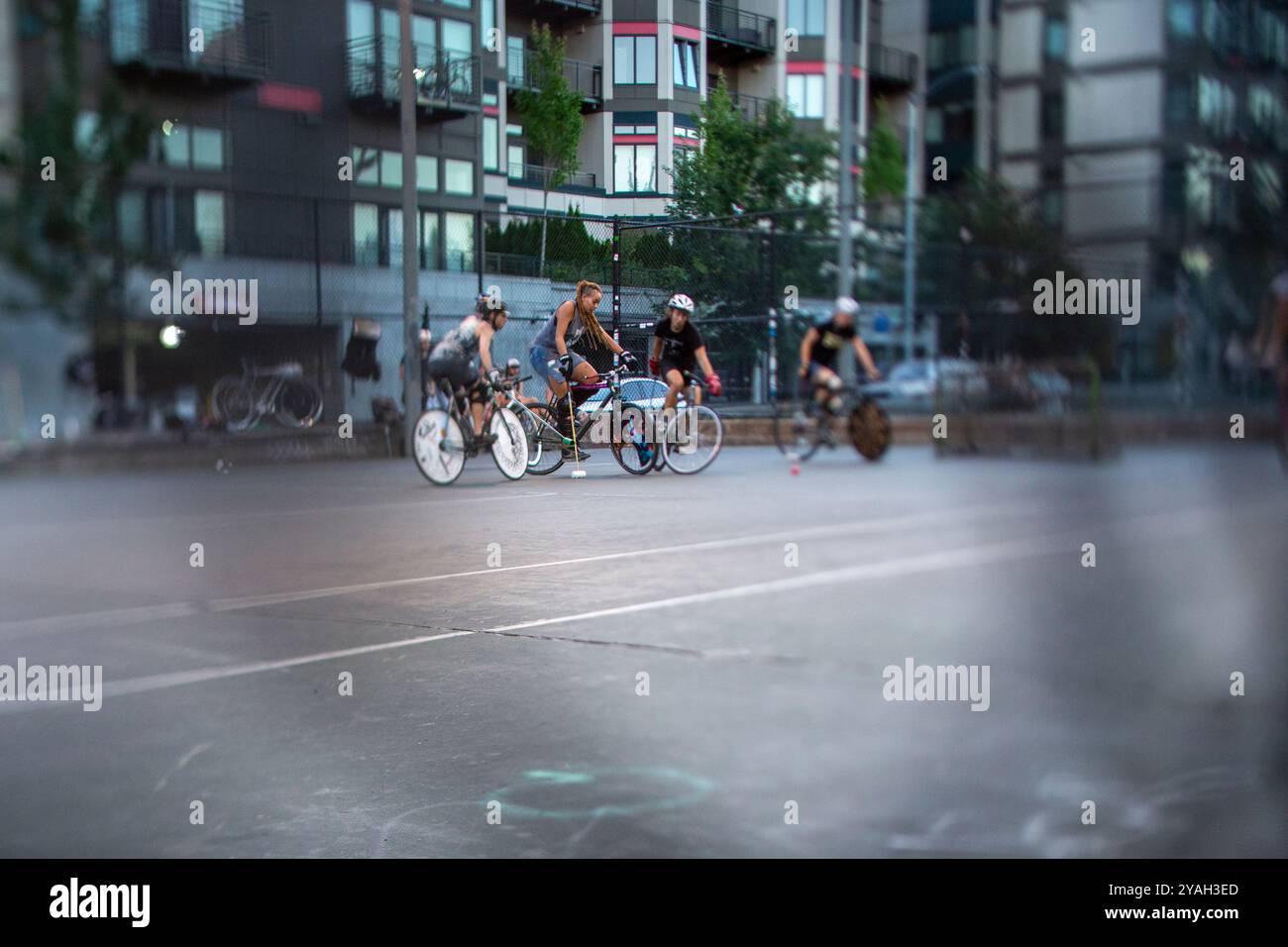 Bicycle polo game on a tennis court in Seattle Stock Photo - Alamy