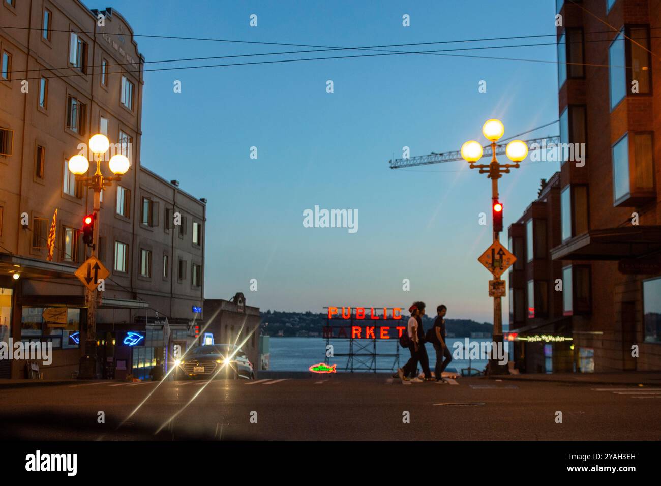 Seattle street scene pedestrians and Pike Place neon sign Stock Photo ...