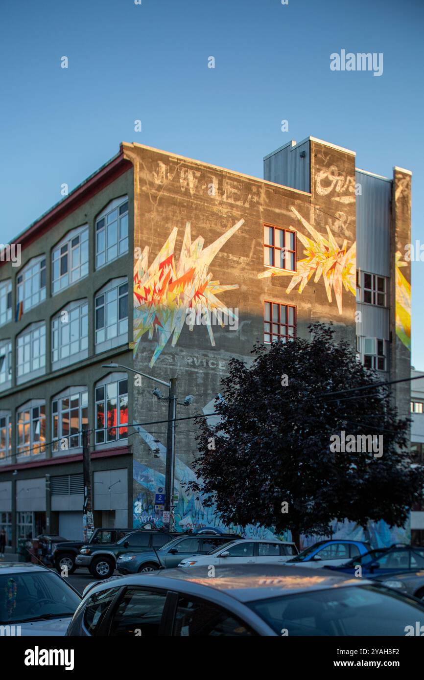 Building hit by last light in urban scene Stock Photo - Alamy