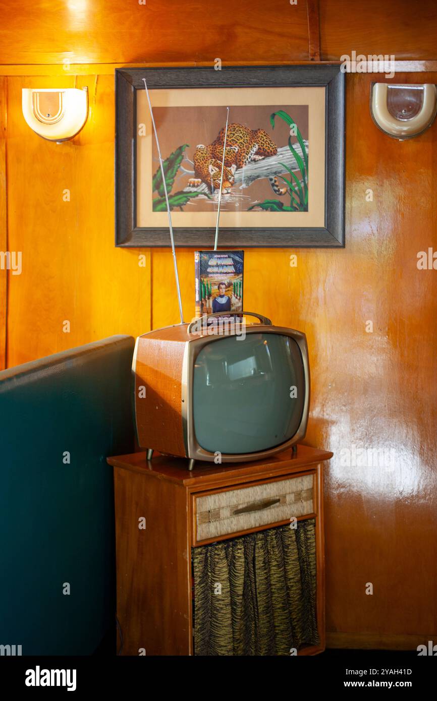 Old retro tv inside trailer with wood paneling Stock Photo - Alamy