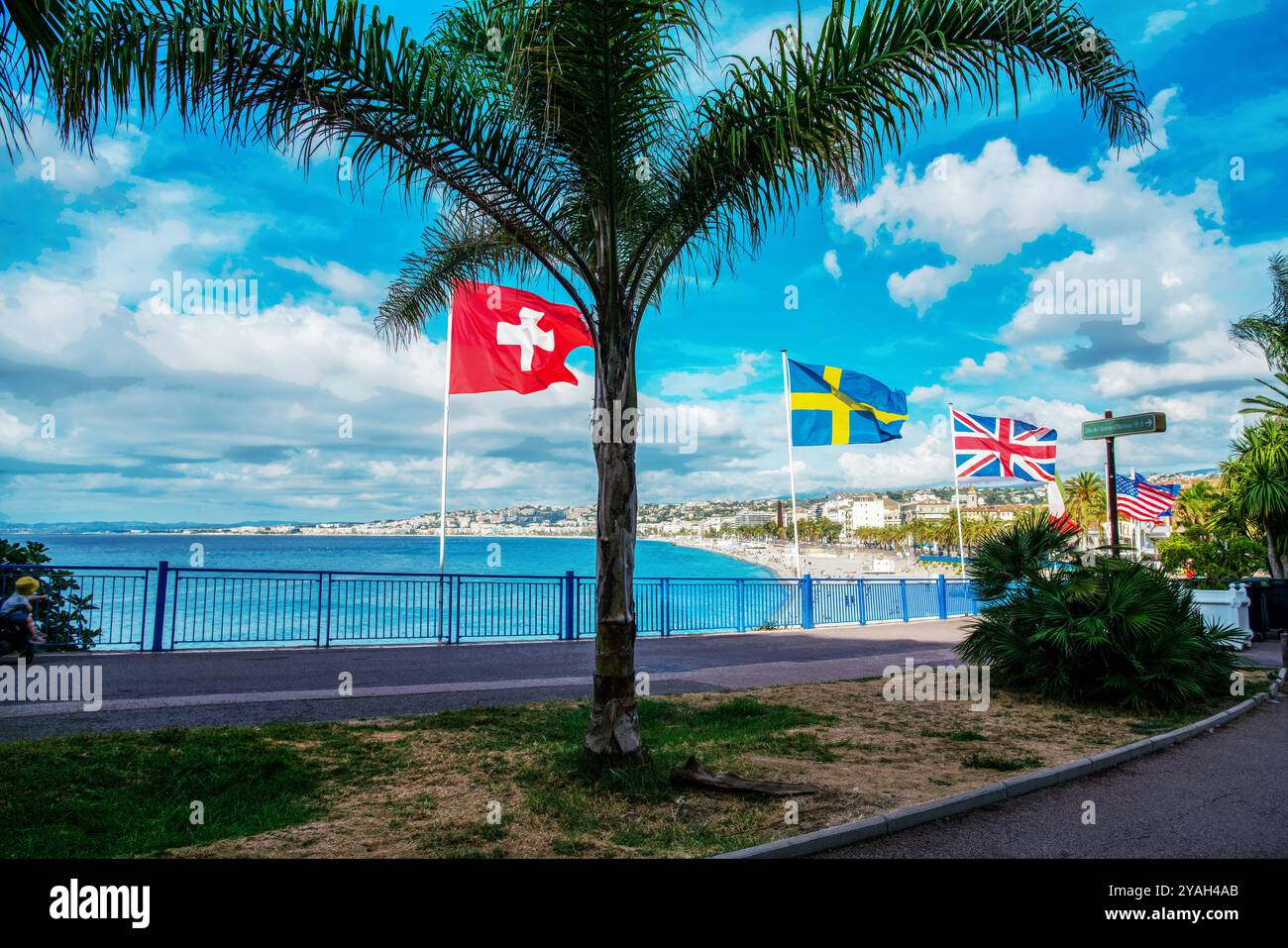 Flags of some countries and behnind beach and famous Promenade des ...