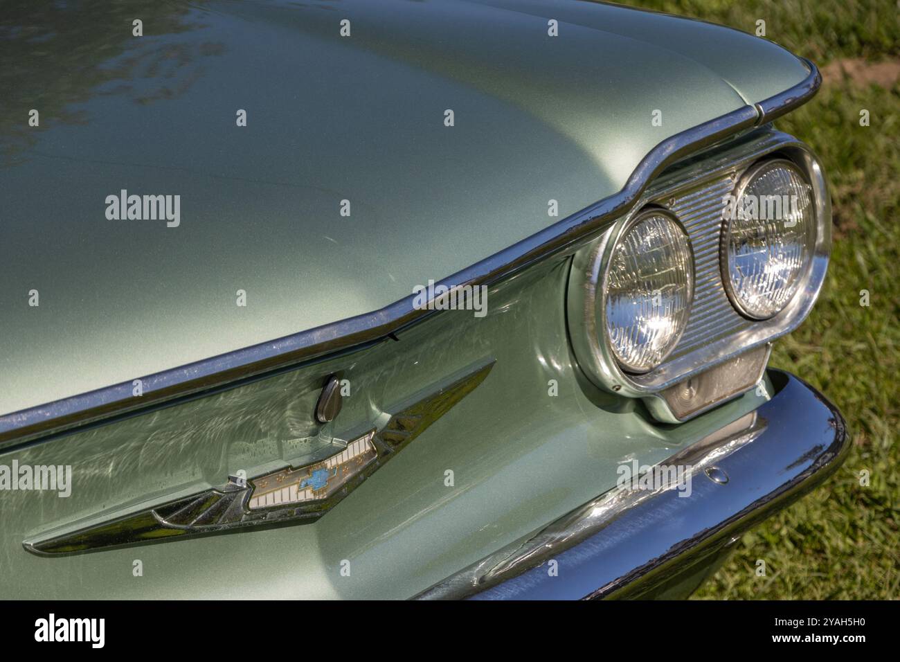 Classic chevrolet corvair on display at a car show, featuring its ...