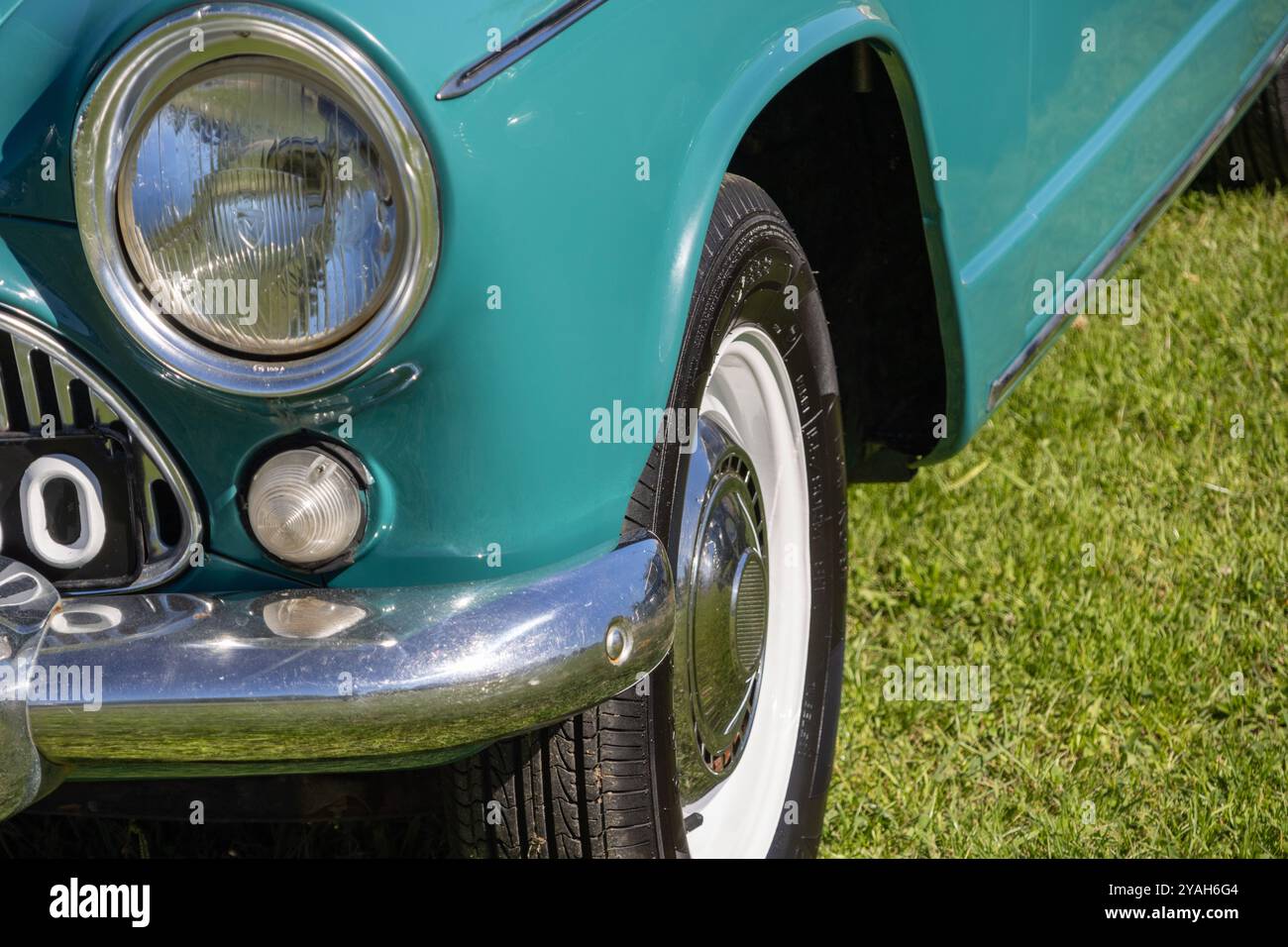 Close up of a turquoise simca aronde vintage car parked on grass ...