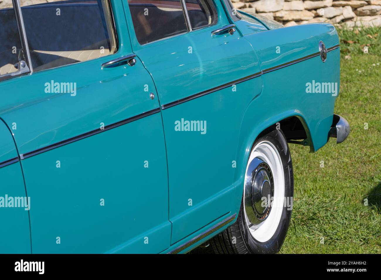 Turquoise simca aronde vintage car with whitewall tires parked on grass ...