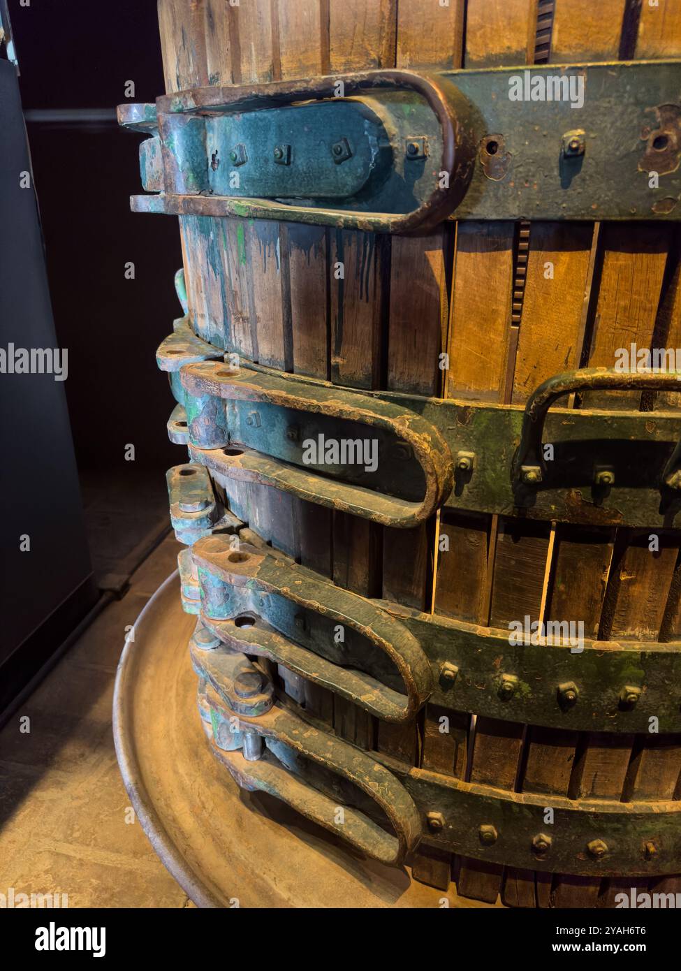 A vintage wooden grape press in the Museo de la Vid y el Vino or Museum ...