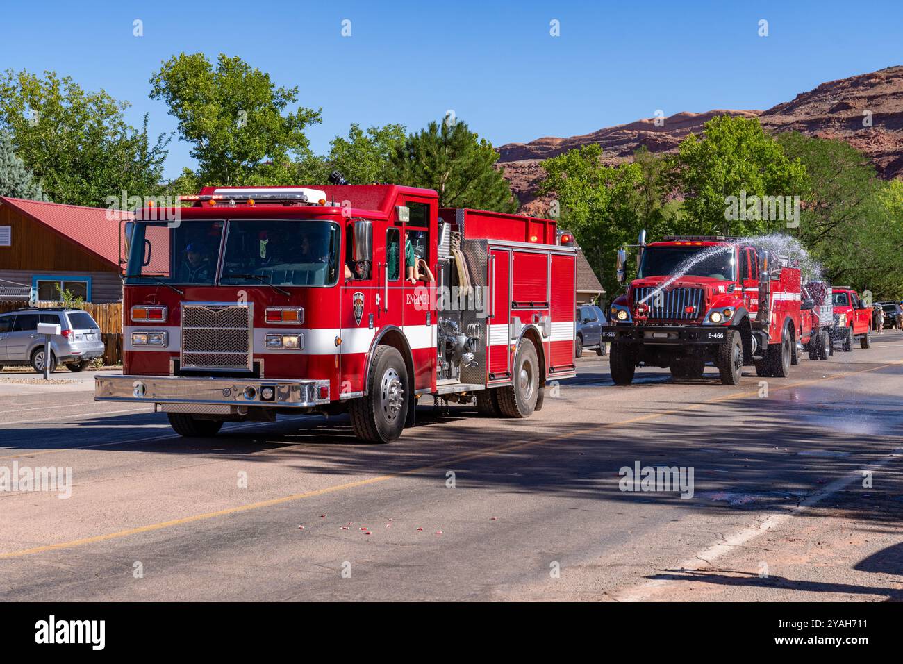 A fire engine sprays water at the crowd in the Fourth of July Parade on ...