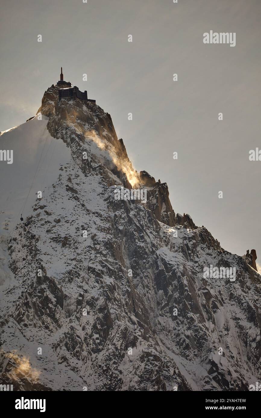The Aiguille du Midi station atop a snowy peak above Chamonix in the ...