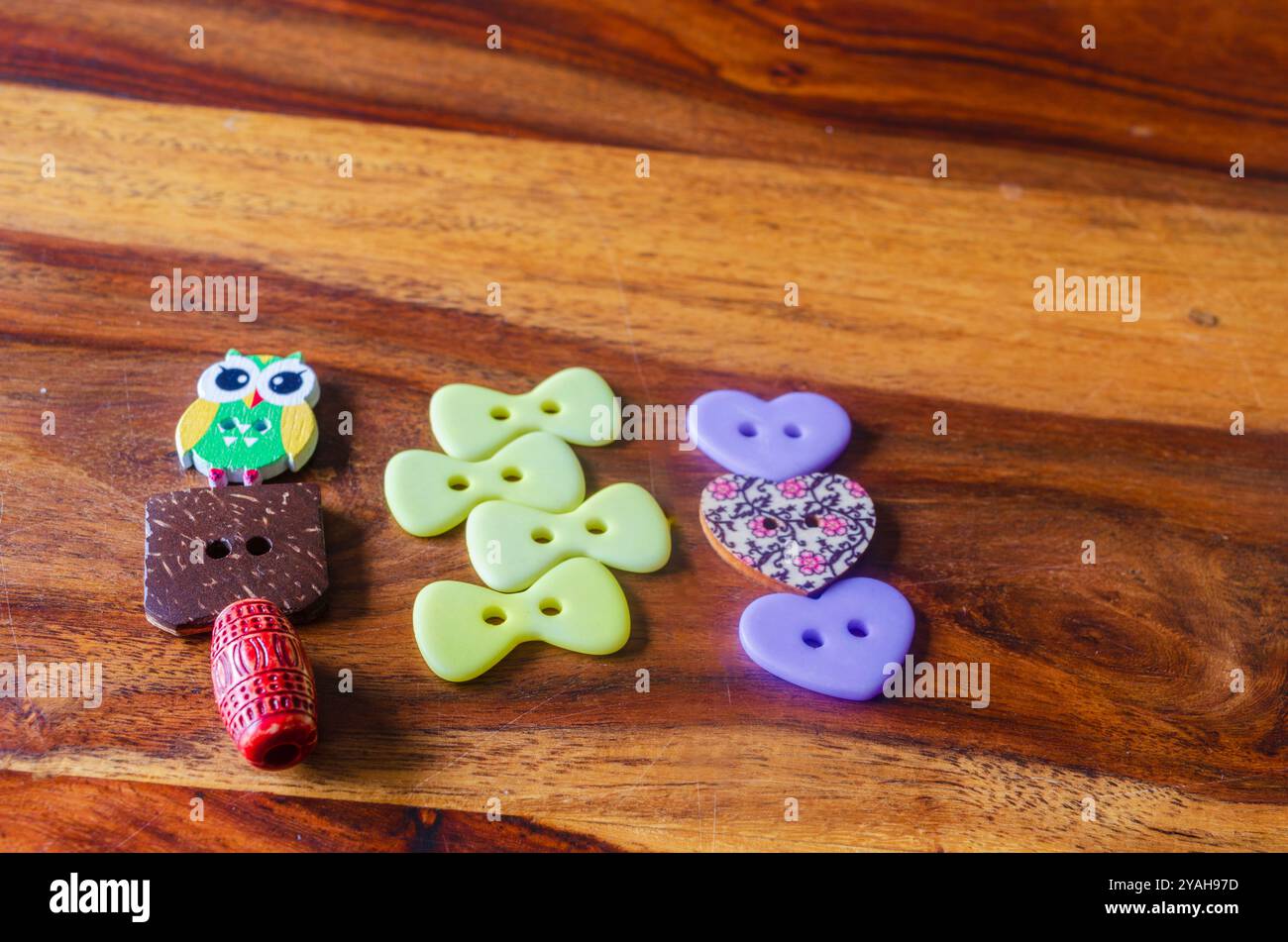 Various shaped buttons with hearts and an owl and barrel Stock Photo ...
