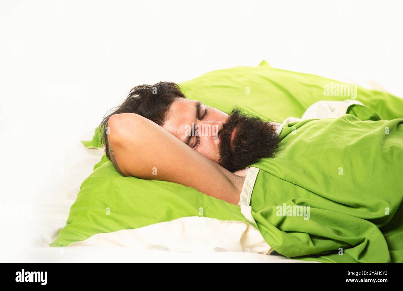 Young man sleeping on bed. Sleeping quietly calmly. Man sleeping on ...