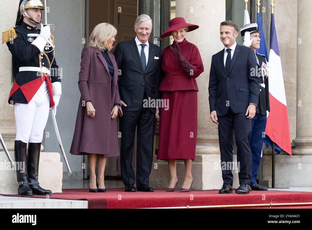 French President Emmanuel Macron and his wife Brigitte Macron welcome ...