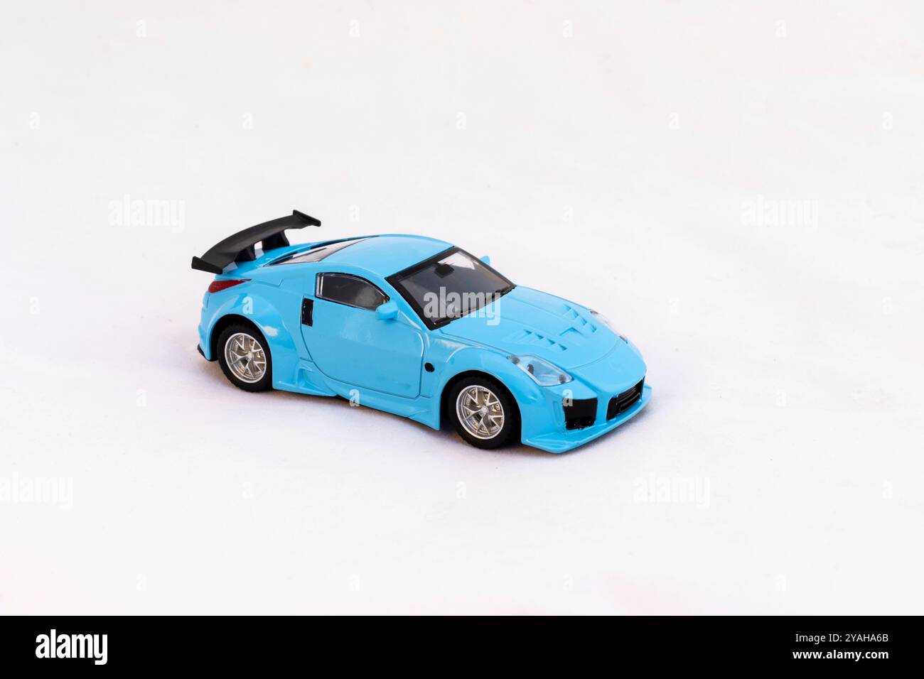 Blue toy sport car front view on white isolated background Stock Photo ...