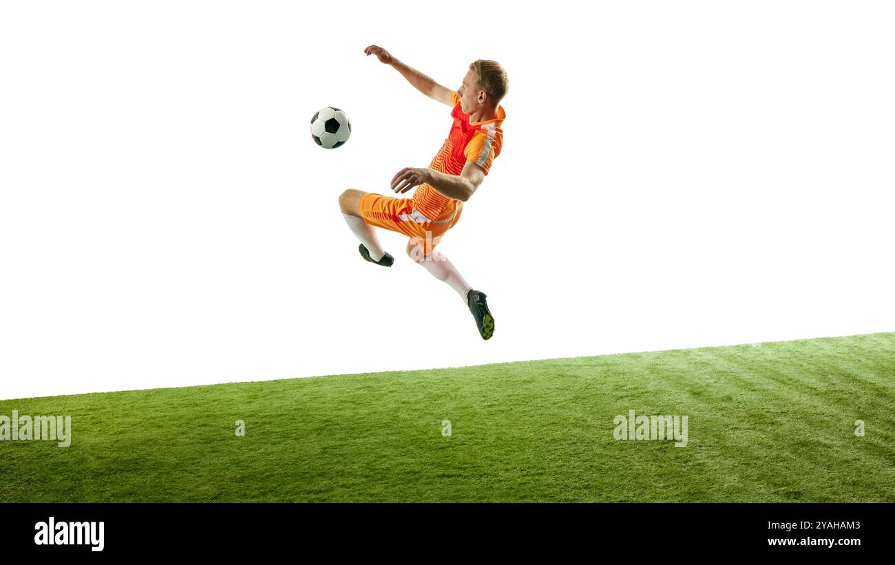 Young soccer player positions for epic kick, pushing limits of his ...