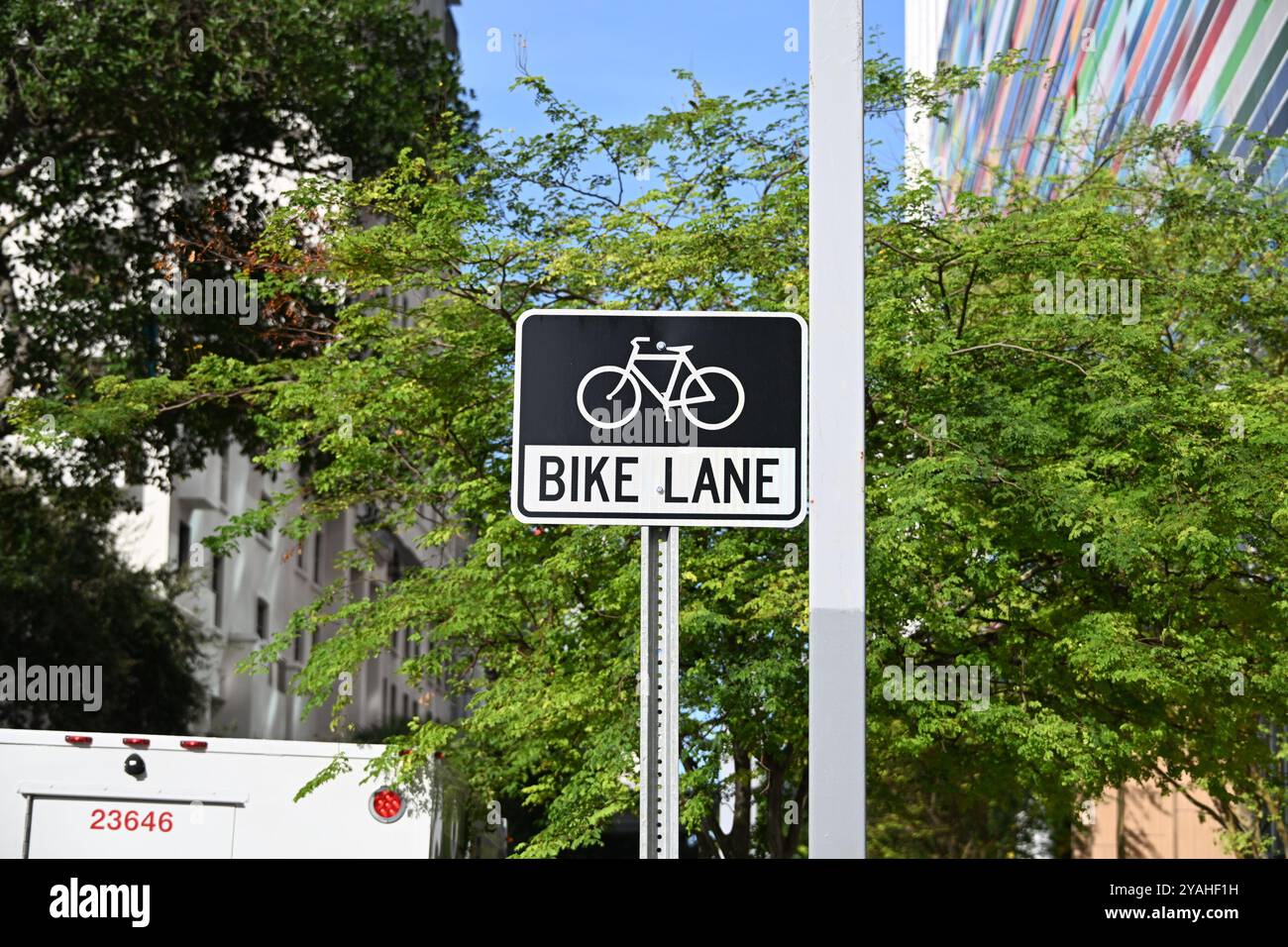 Bike lane street sign board in miami brickell Stock Photo - Alamy