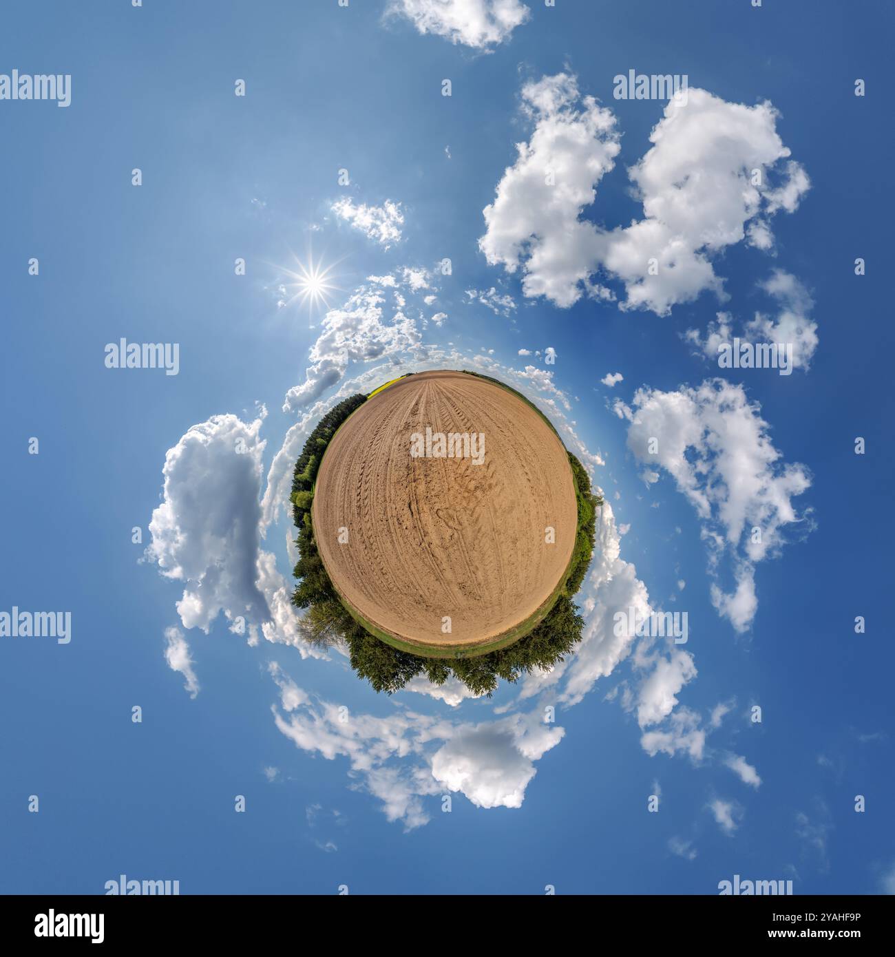 simple little tiny planet without buildings in blue sky with sun and ...