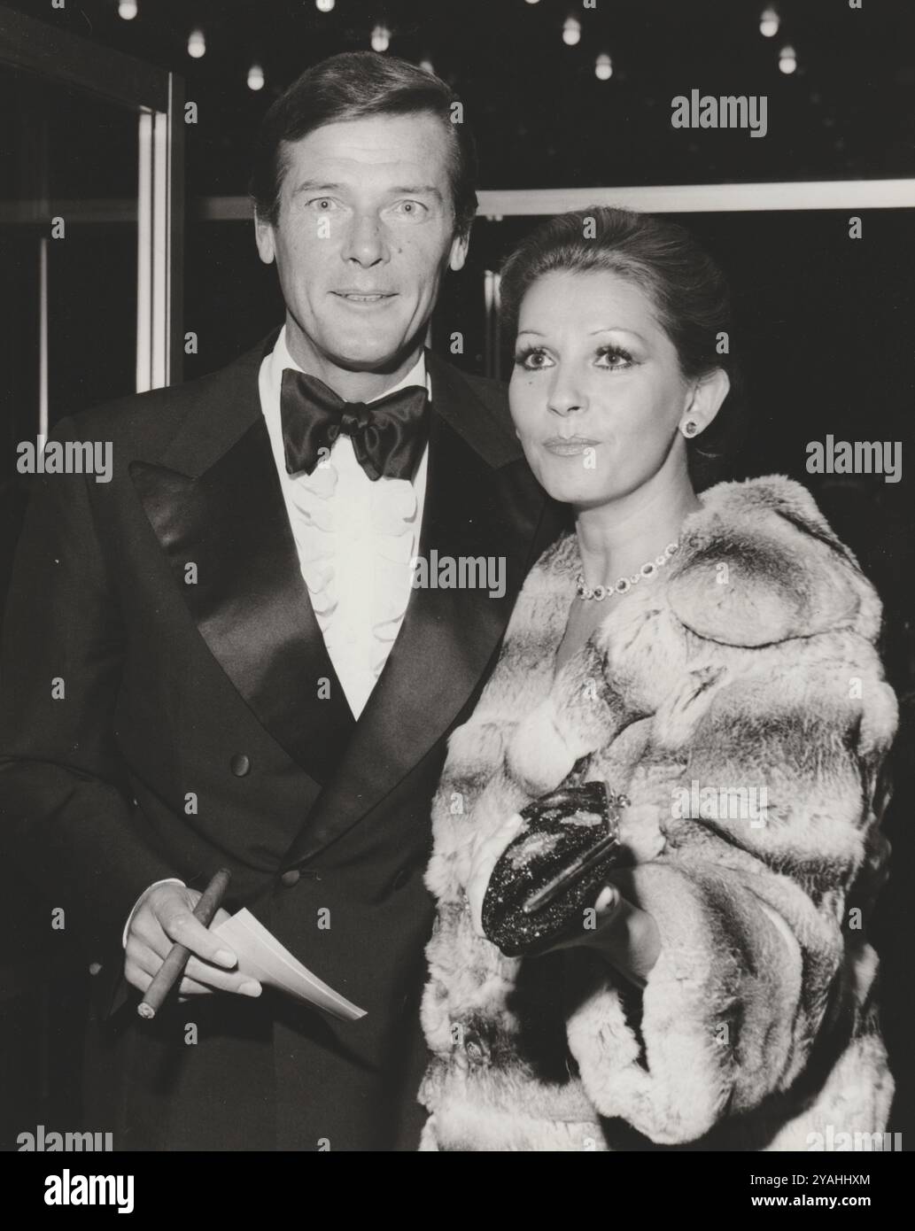 Roger Moore Candid Photograph With Wife Stock Photo - Alamy