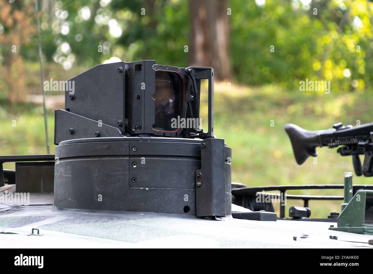 Periscope on the roof of a modern tank, close-up. Exhibition of ...