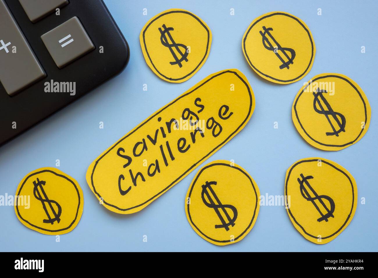 The label savings challenge with dollar signs and a calculator ...