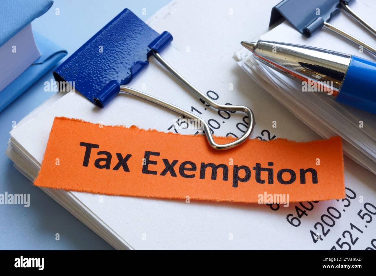 Tax exemption documents on a table Stock Photo - Alamy