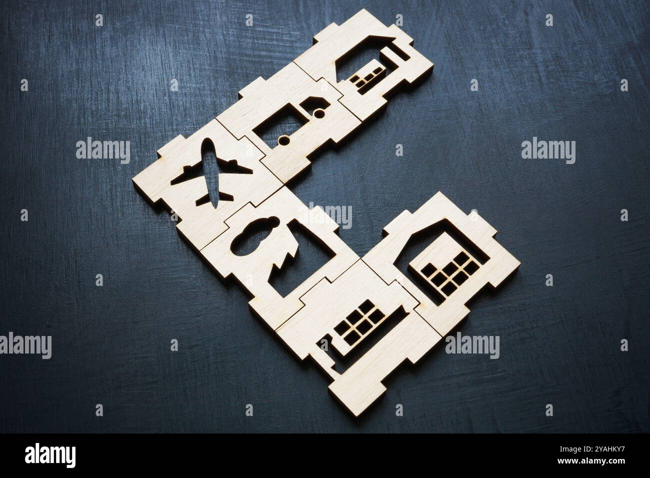 A wooden puzzle about supply chain management. Interconnected processes ...