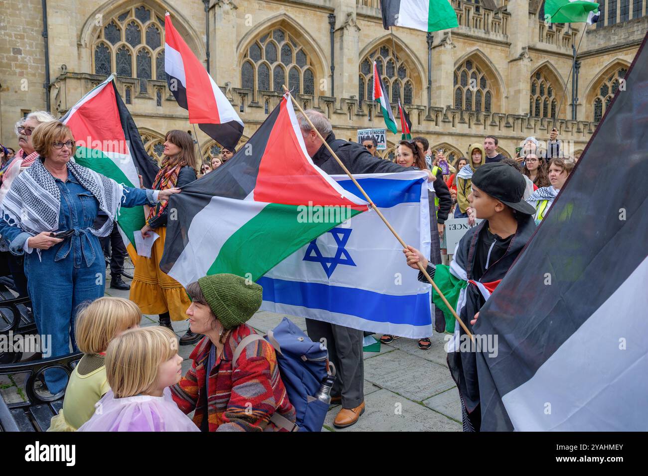 A man carrying the flag of Israel is pictured as he argues with pro ...