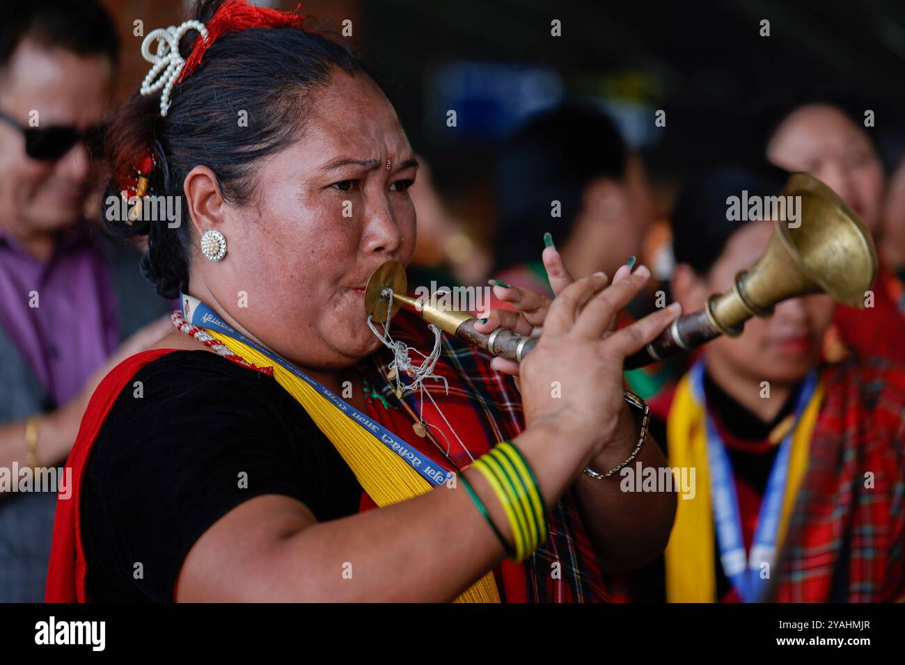 Kathmandu, Nepal. 14th Oct, 2024. A woman dressed in traditional attire ...