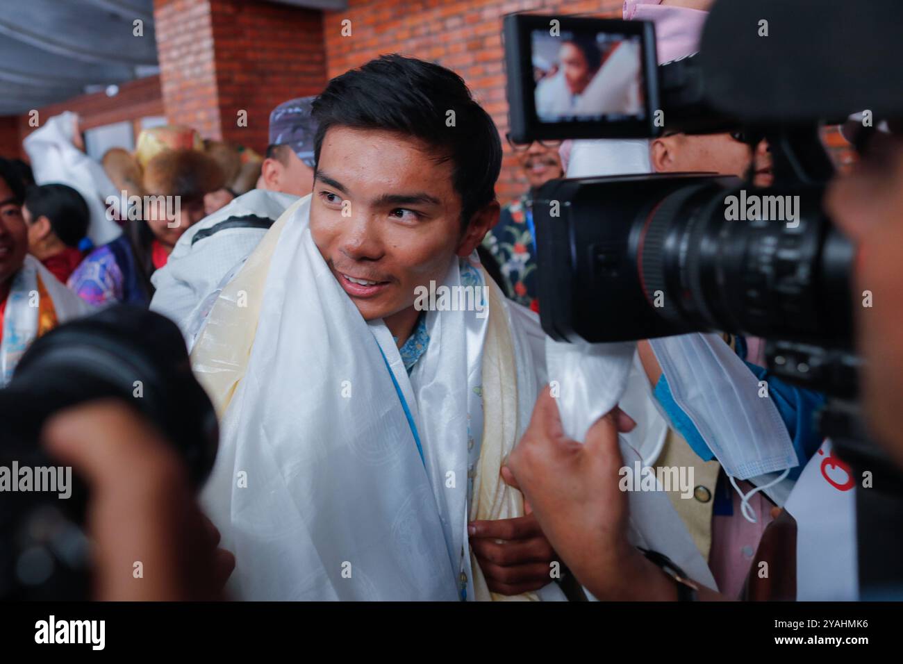 Kathmandu, Nepal. 14th Oct, 2024. Nima Rinji Sherpa, 18 years old, the youngest person to summit ...