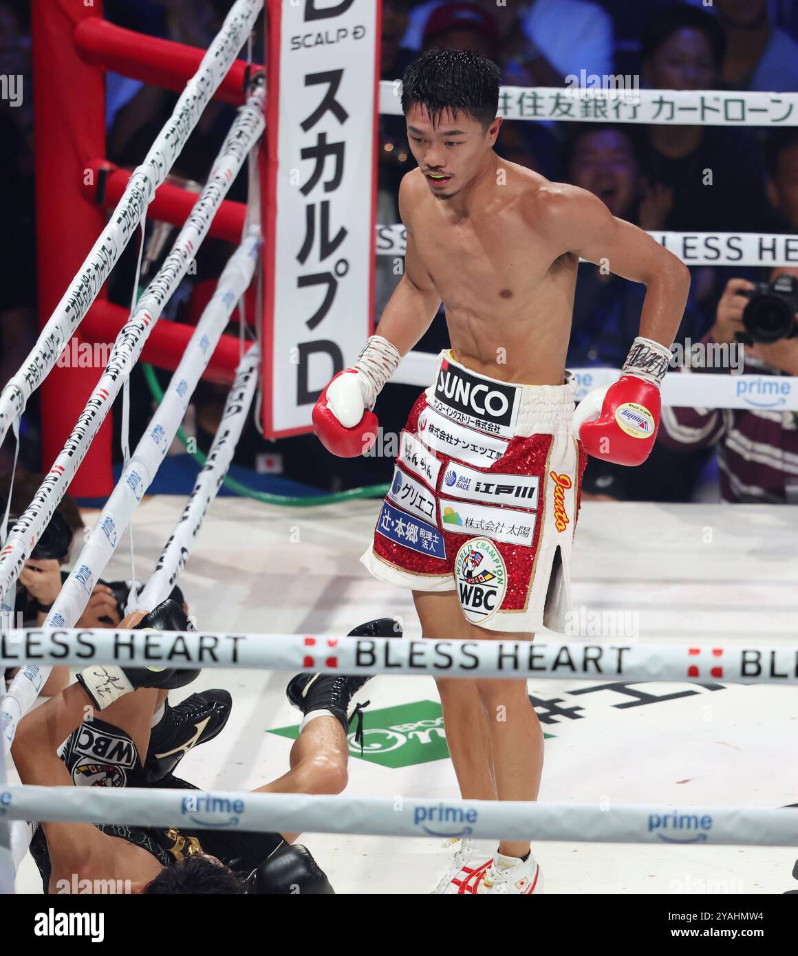 Japan's Junto Nakatani hits a punch on Thailand's Petch Sor Chitpattana ...