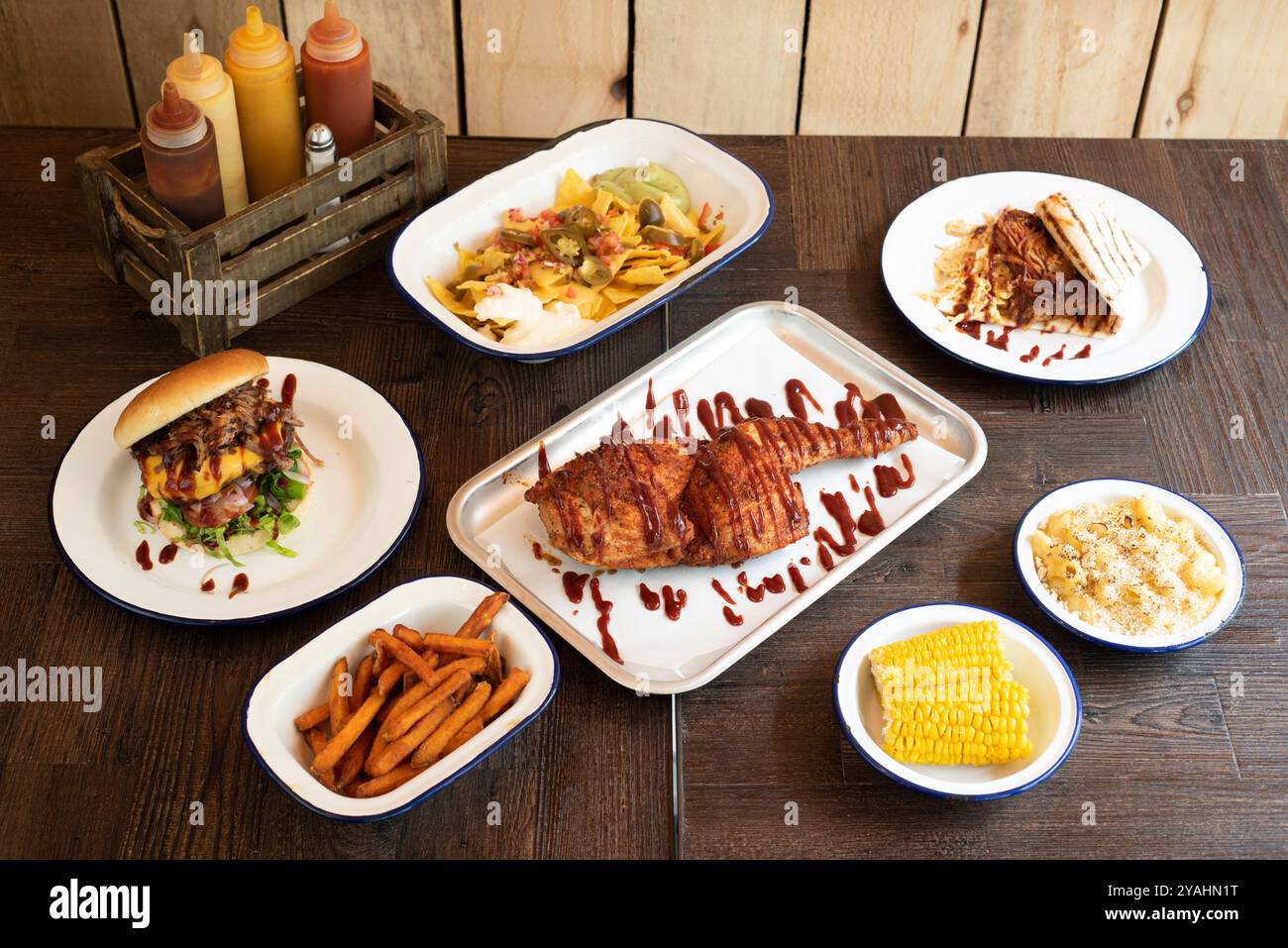 BBQ restaurant dishes including BBQ chicken, ribs, pulled port, beef ...