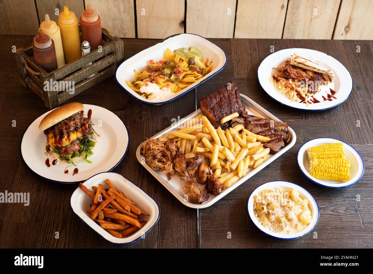 BBQ restaurant dishes including BBQ chicken, ribs, pulled port, beef ...