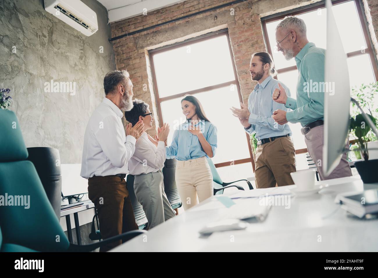 Photo of teamwork people working together applause clap hands ...