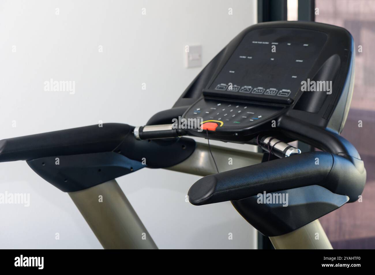 Treadmill and Cross Trainers Side by Side in Gym Stock Photo - Alamy