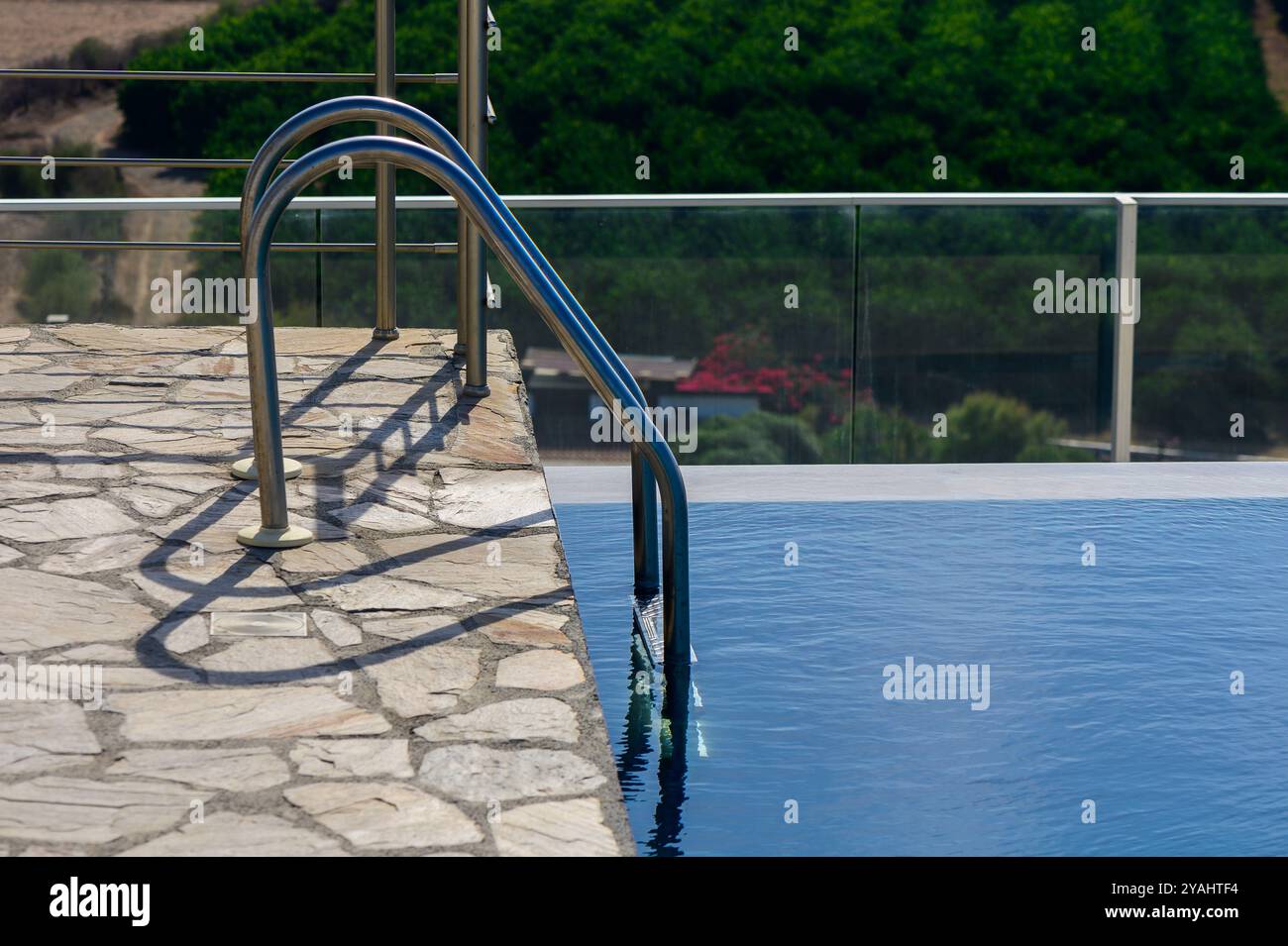 Outdoor swimming pool handrails hi-res stock photography and images - Alamy