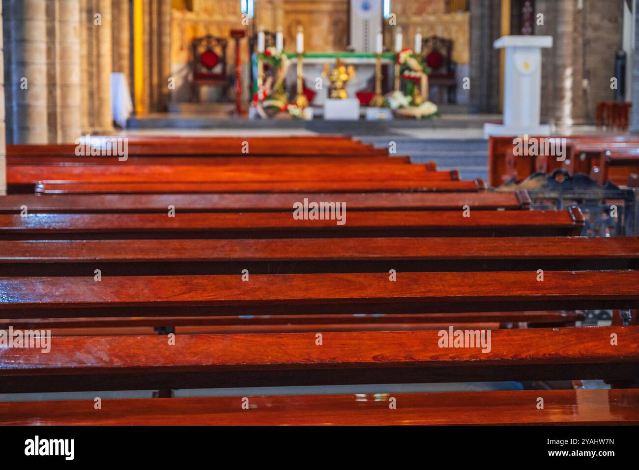 Wooden benches inside the Catholic Cathedral Stone Church in Nha Trang ...