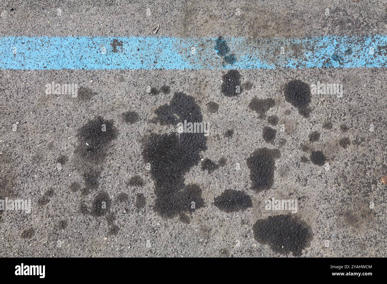 Parking oil stains in Italy. Ground pollution problem. Oil spots on ...