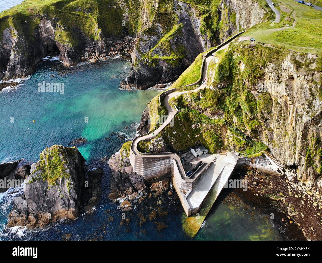 Dunquin Pier in County Kerry in Ireland. Drone point of view. Summer view of Dingle Peninsula ...