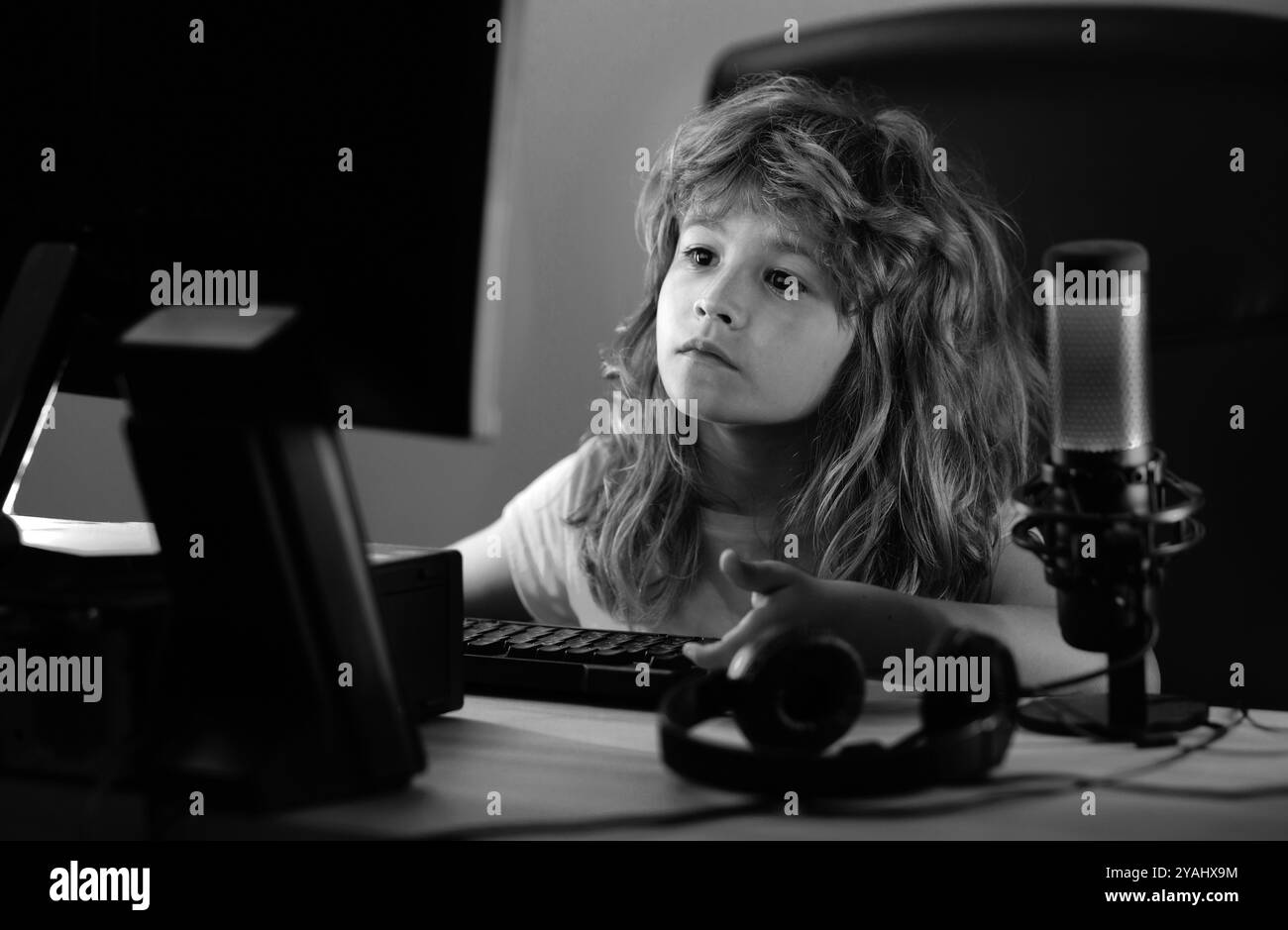 Clever kids learning online home. Caucasian child boy working on laptop ...