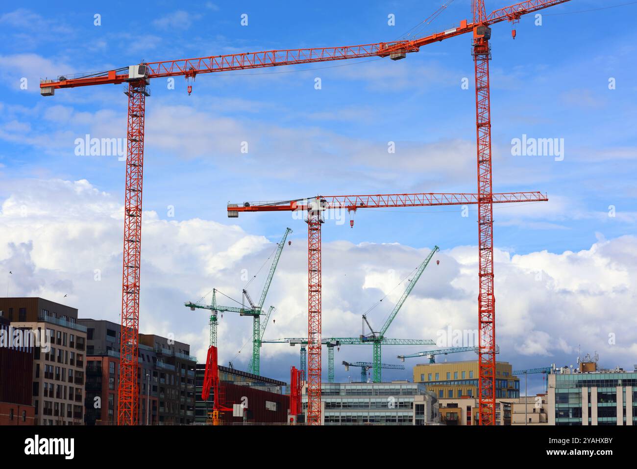 Construction site in North Wall in Dublin, Ireland. Construction cranes ...