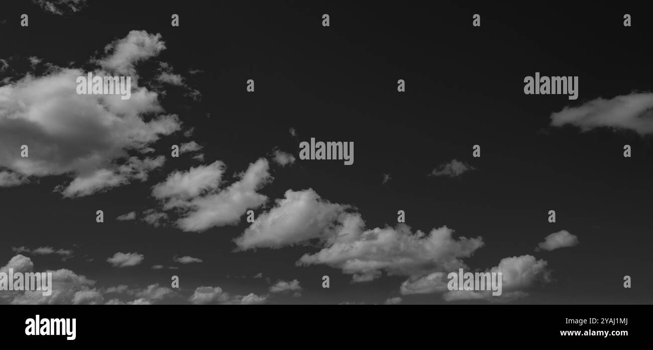 Panoramic sky puffy clouds Black and White Stock Photos & Images - Alamy