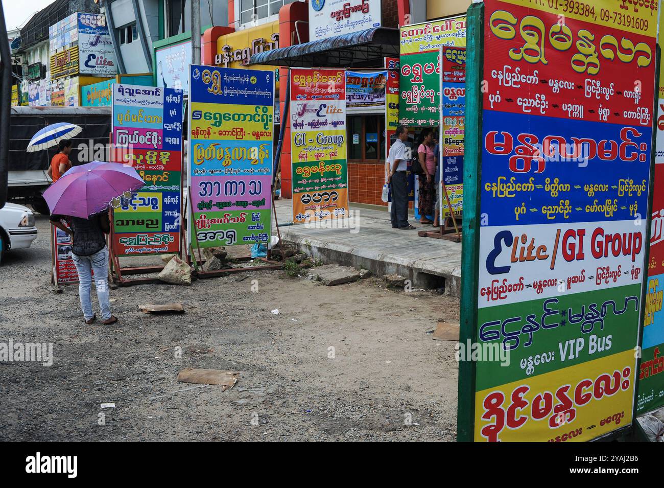 11.10.2013, Myanmar, , Yangon - Colourful advertising posters of ...