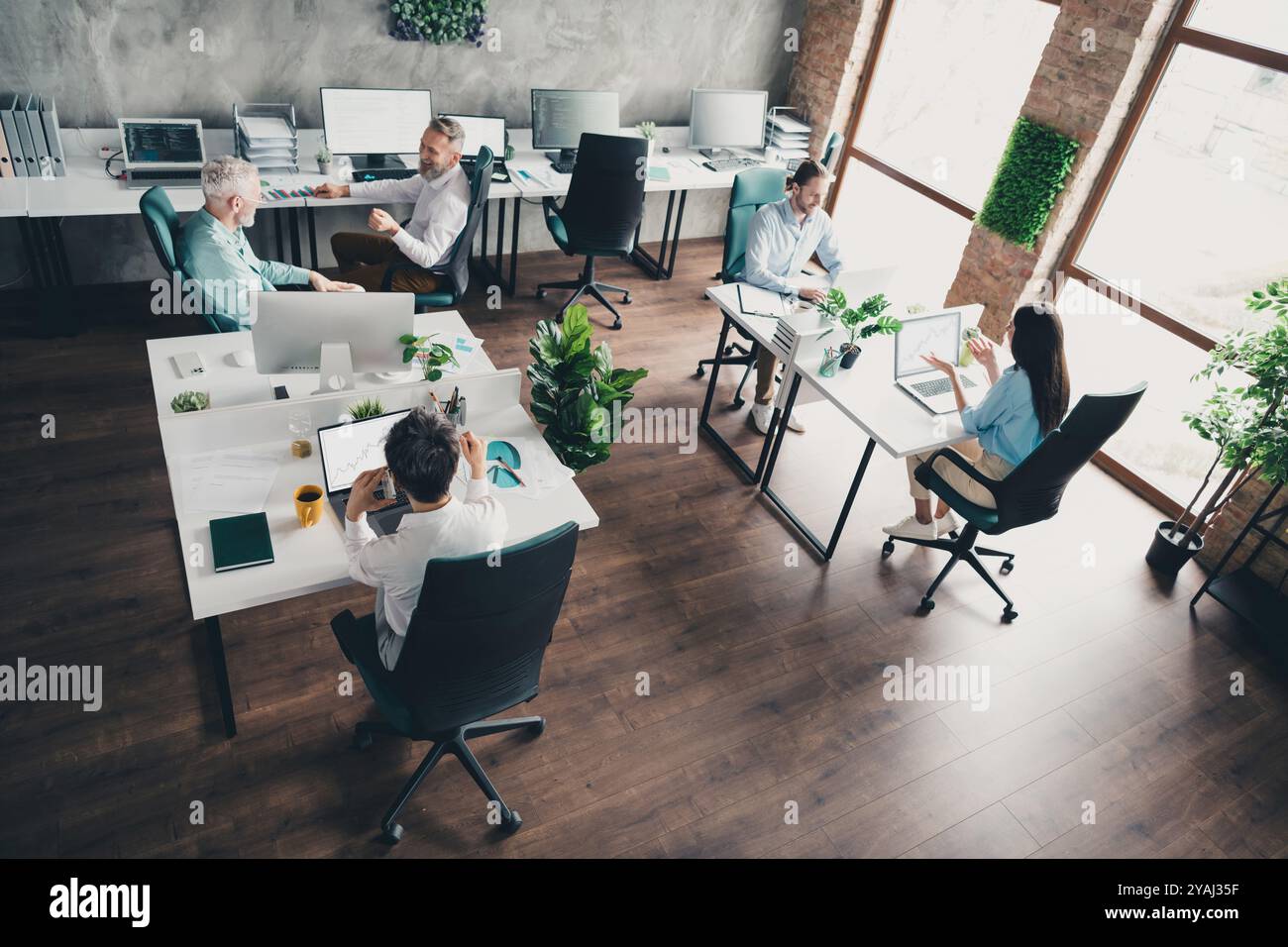 Full body photo of teamwork people working together sit tables ...
